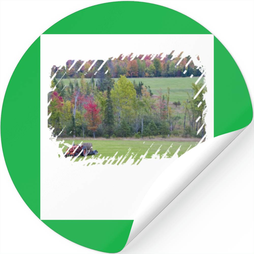 Tractor With Hay Bale In Green Field With Stickers